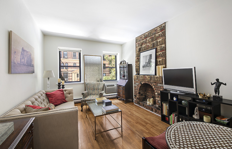 Charming Chelsea 1BR With Brick Fireplace Asks $560K | StreetEasy